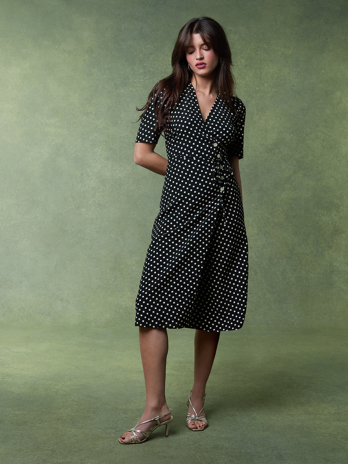 Black polka dot mid-length wrap dress | Rouje