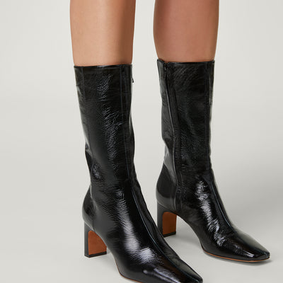 Heeled ankle boots in black patent leather | Rouje