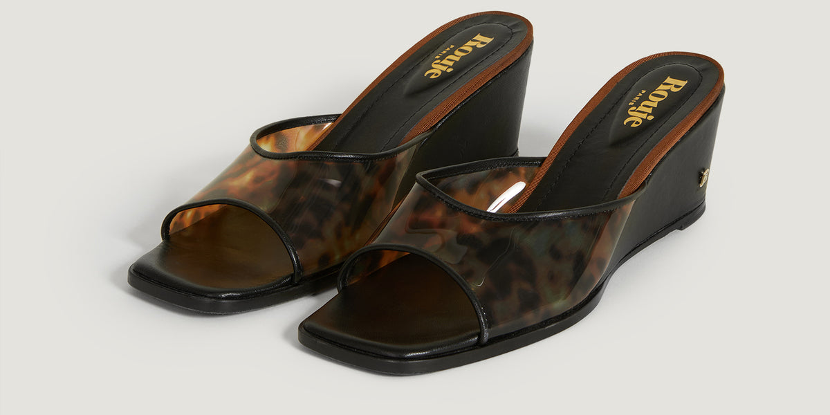 Platform mules in leather and tortoise vinyl | Rouje