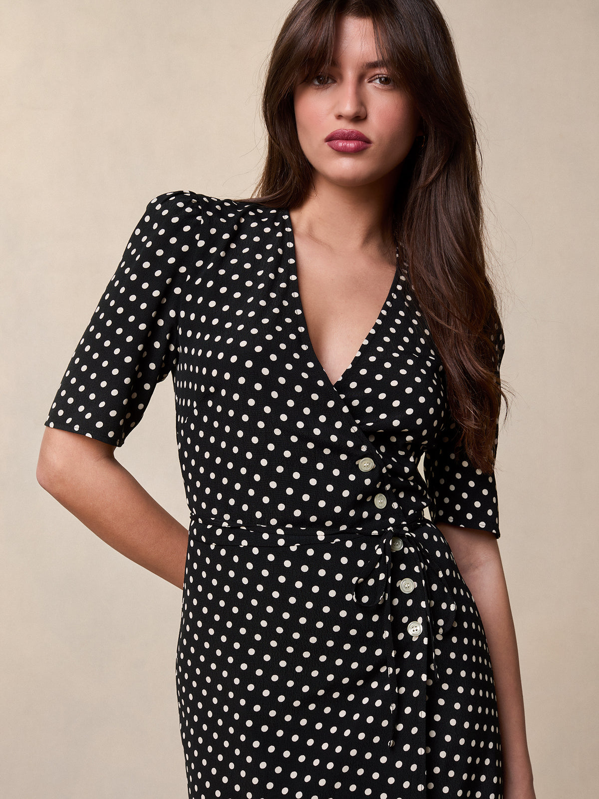 Black polka dot mid-length wrap dress | Rouje